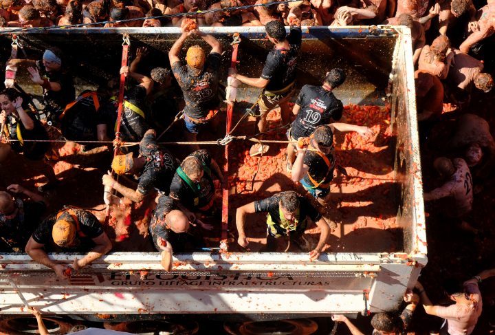 La Tomatina: Epic tomato fight leaves Spanish town stained by saucy ...