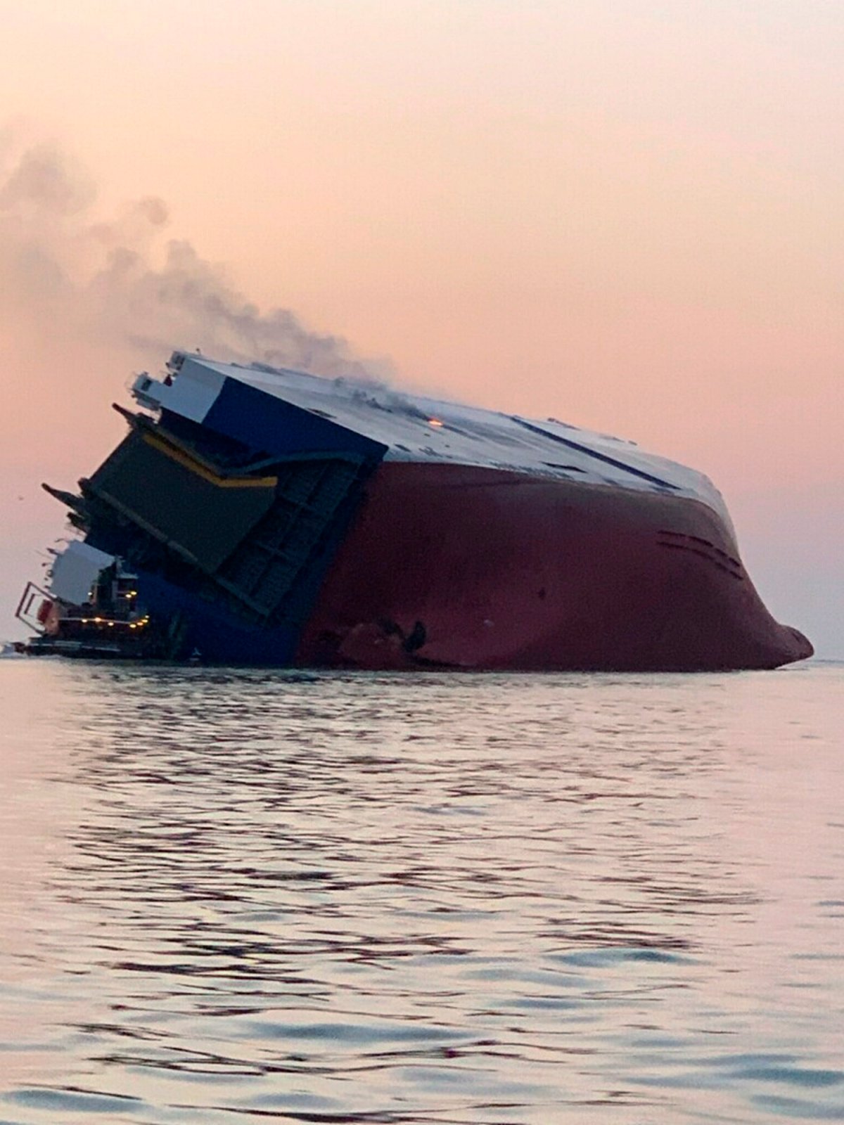 4 missing crew members rescued after cargo ship overturns near Georgia ...