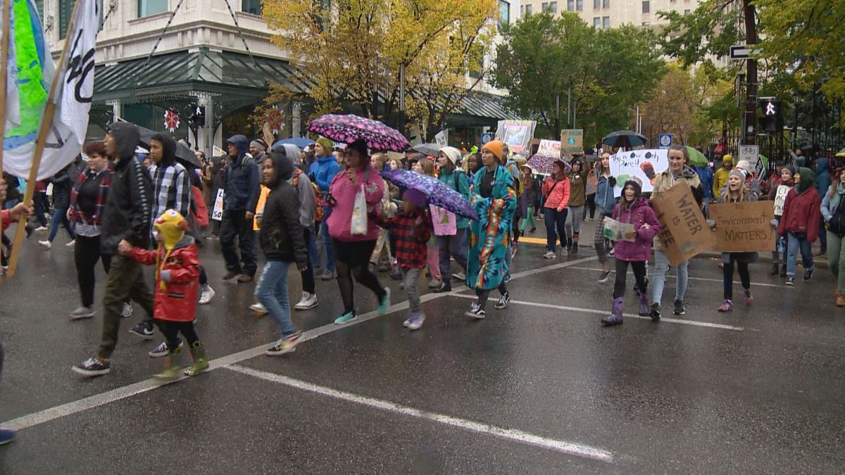 Calgary students march through downtown in rally for action on climate ...