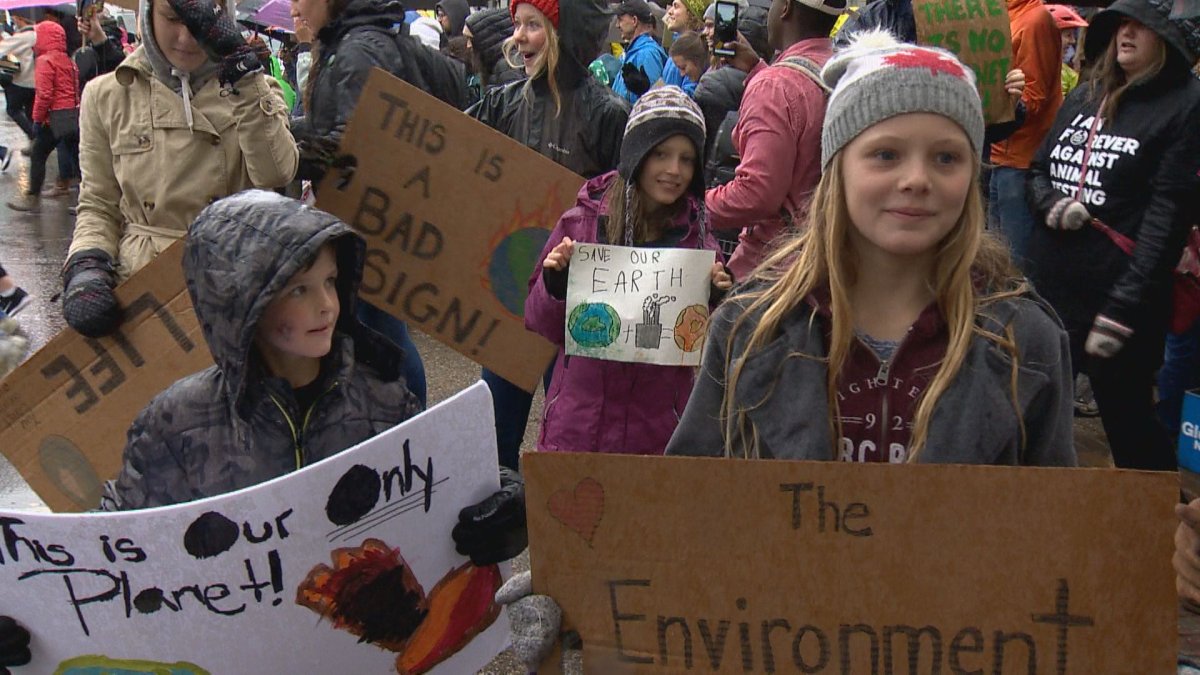 Calgary students march through downtown in rally for action on climate ...