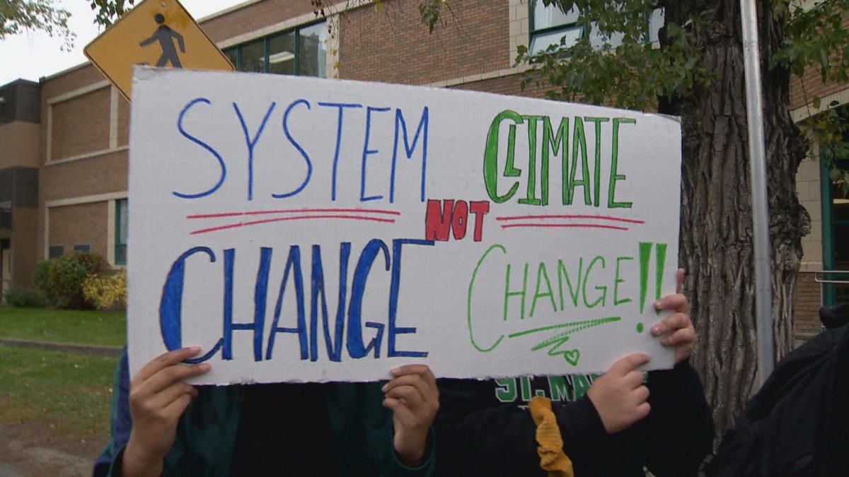 Calgary students march through downtown in rally for action on climate ...