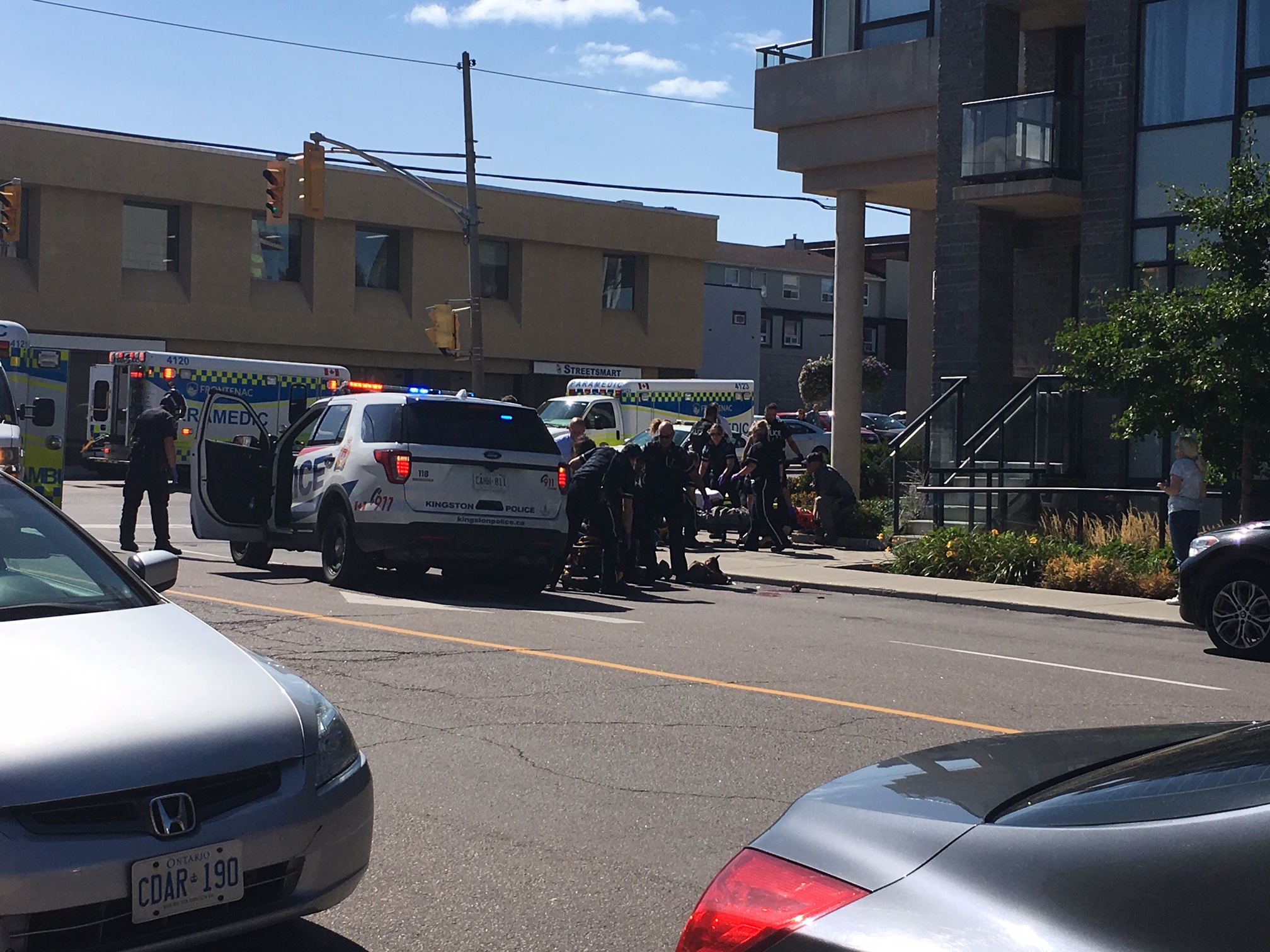 2 dead following brutal stabbing, police shooting in downtown Kingston ...