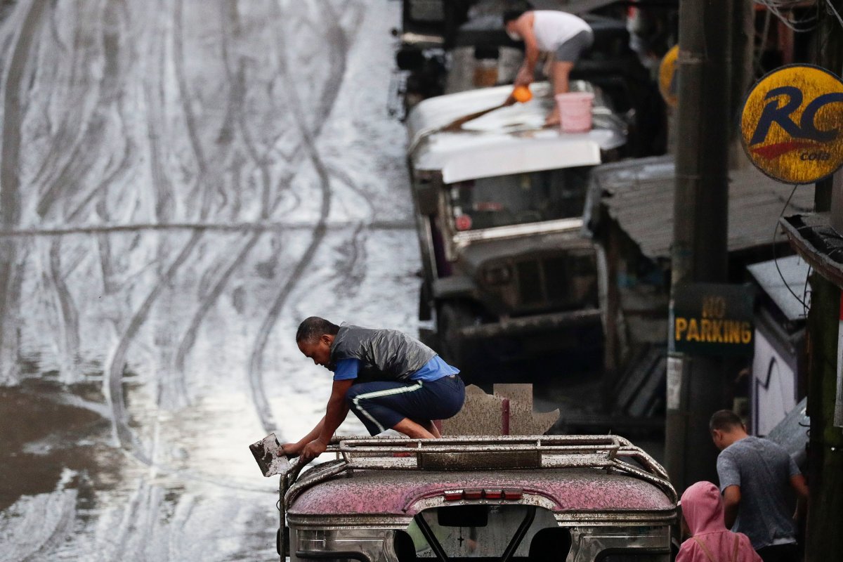 Villagers flee, airport closes after small volcano erupts near Manila ...