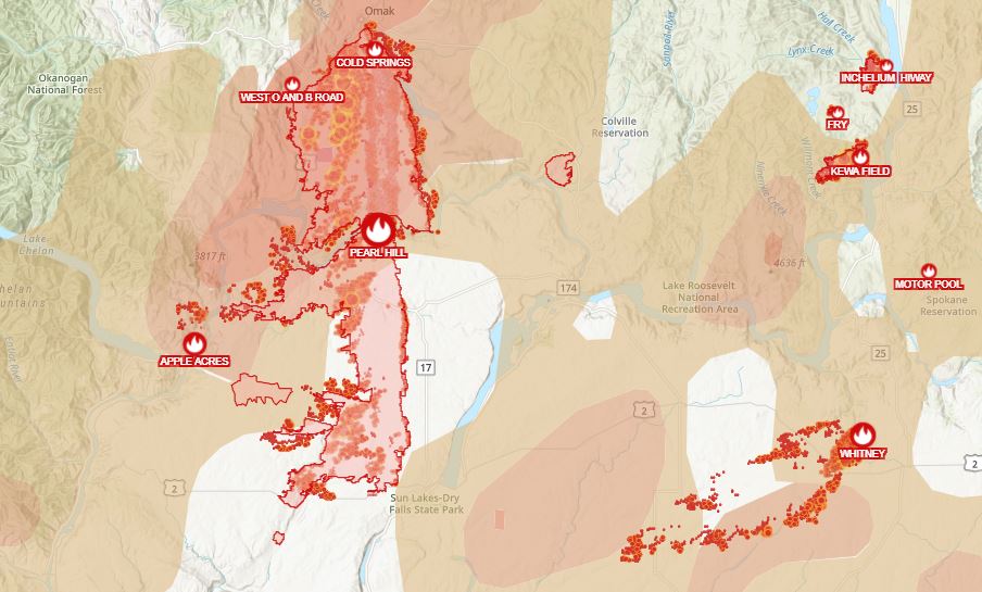 Two massive wildfires burning south of border near Omak, Wash ...