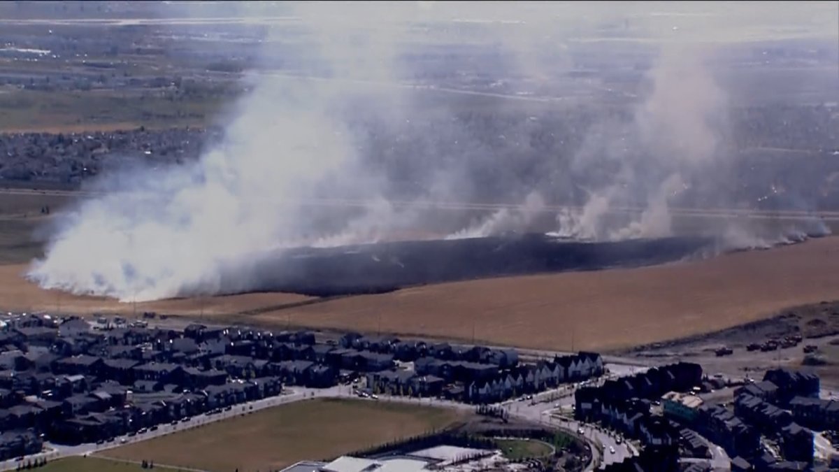 Large grass fire burns in north Calgary farmer’s field - Calgary ...