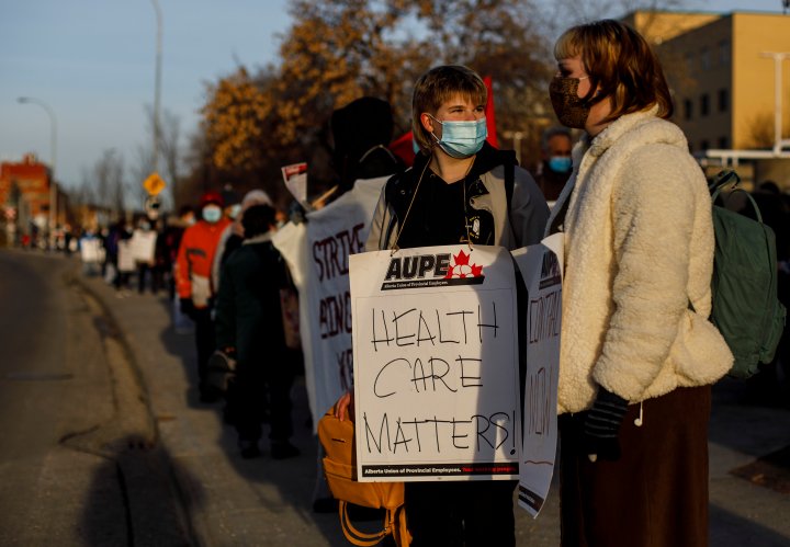Health-care workers walk off the job in wildcat strikes across Alberta ...