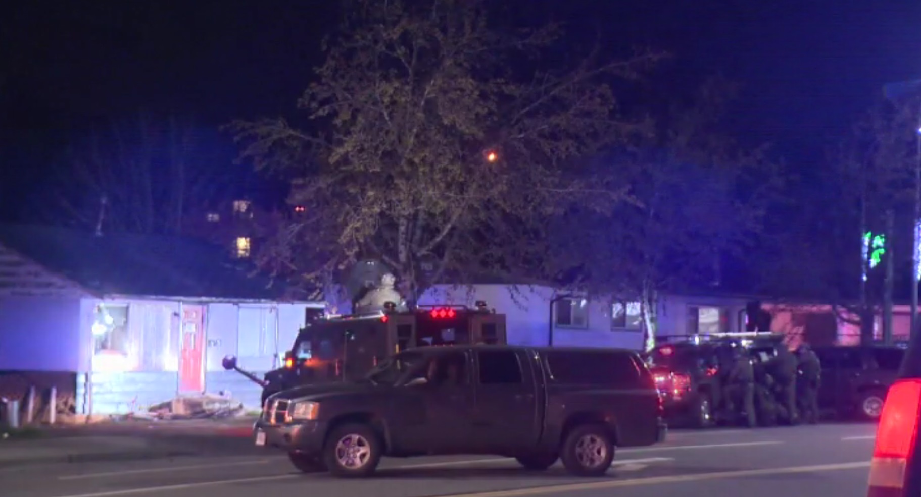 Abbotsford Police remain at scene of stand-off outside bullet-riddled ...