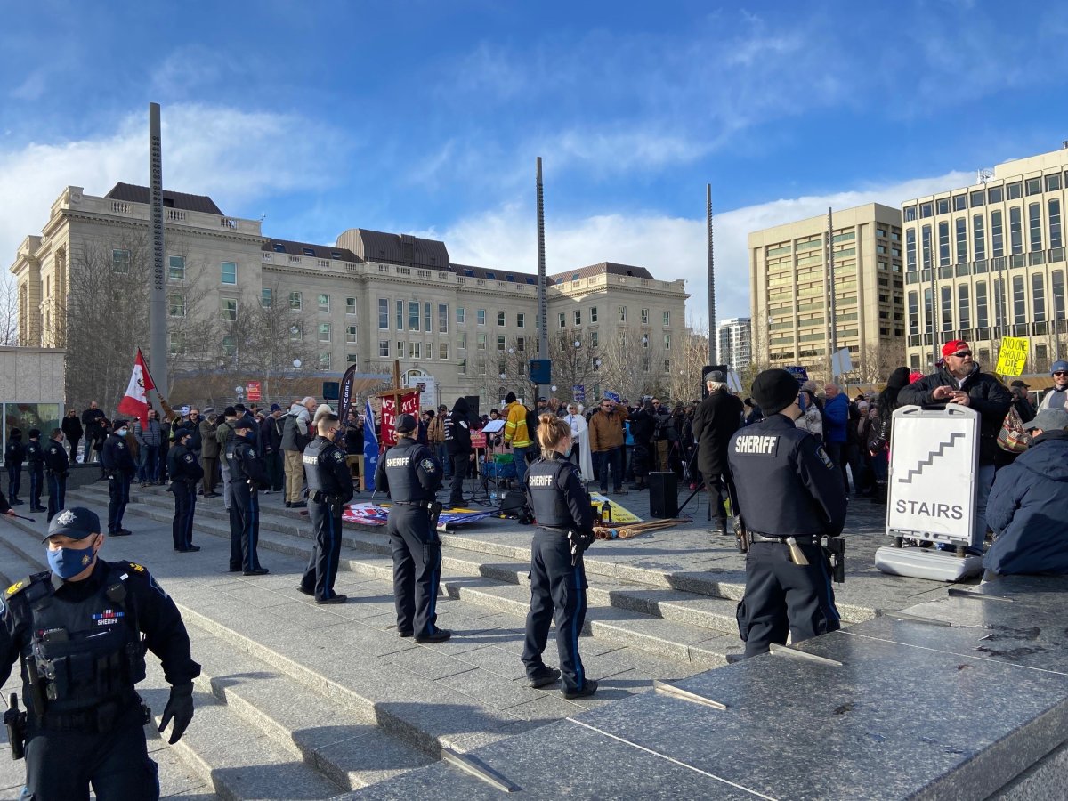 Protesters gather from across the province at Alberta legislature to ...