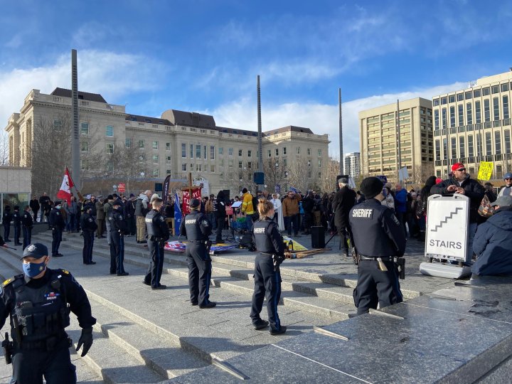 Protesters gather from across the province at Alberta legislature to ...