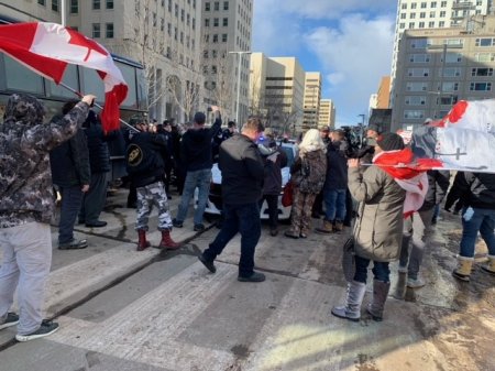 Protesters gather from across the province at Alberta legislature to ...