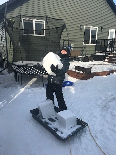 Alberta boy endures cold temperatures and many hours to build backyard ...