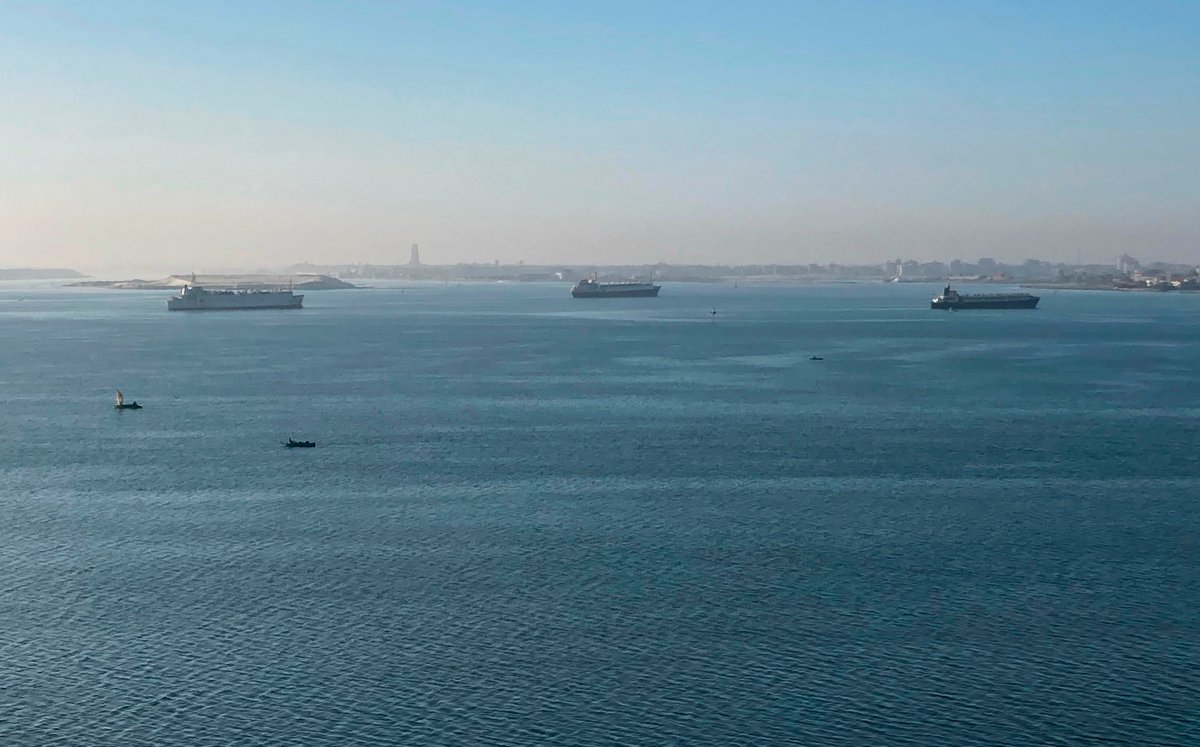 Satellite images show how one ship stuck in Suez Canal is causing so ...