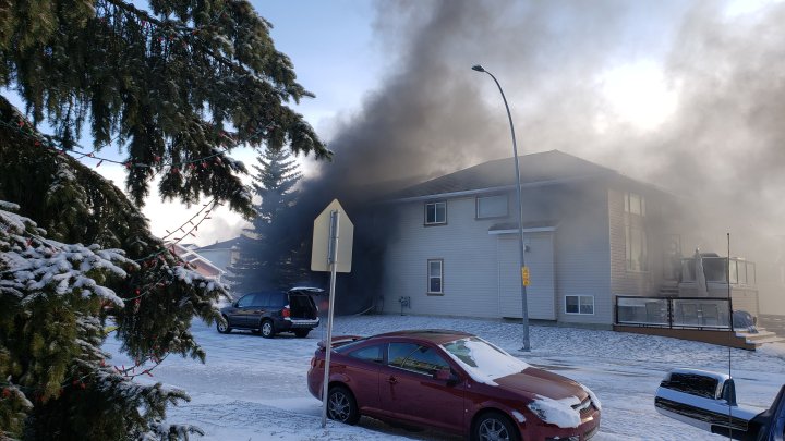 Crews battle house fire in northwest Calgary - Calgary | Globalnews.ca