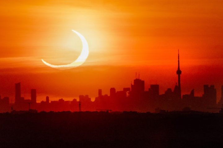 Stunning photos show solar eclipse as a ‘ring of fire’ over Canada ...