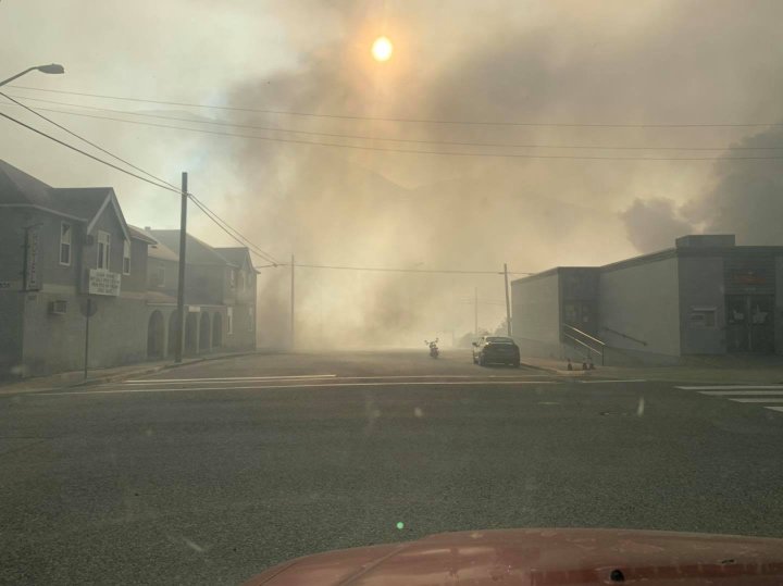 IN PHOTOS: Scenes of destruction after wildfire destroys village of ...