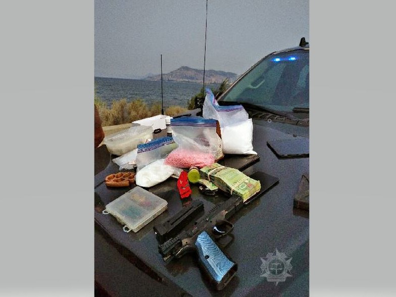 Drugs, weapons, cash seized by B.C.’s anti-gang task force in Kelowna ...