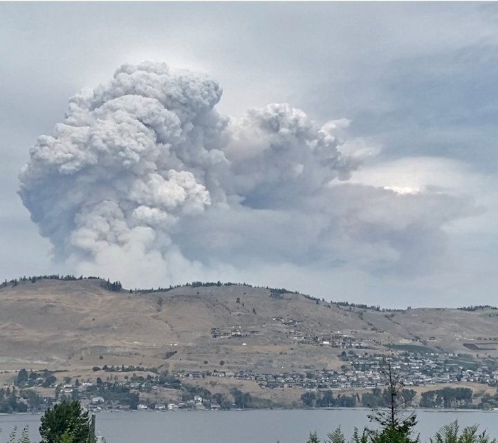 IN PHOTOS: Enormous column of smoke rises from White Rock lake wildfire ...