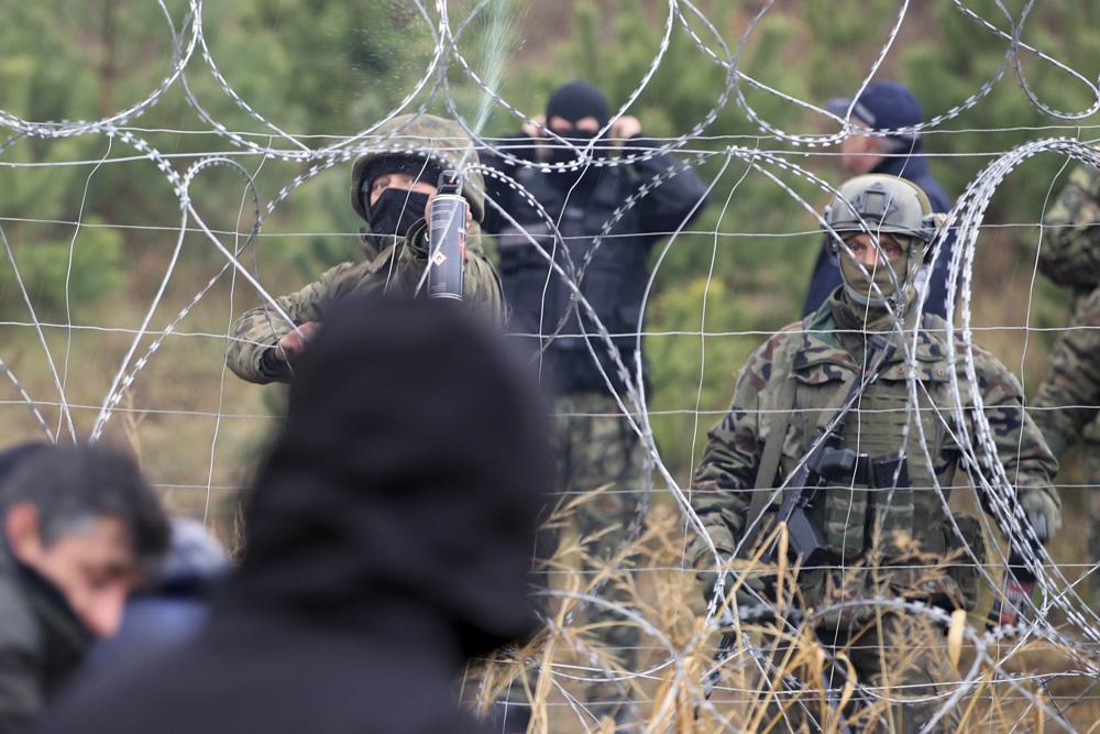 Poland-Belarus border reinforced by riot police, leaving hundreds of ...