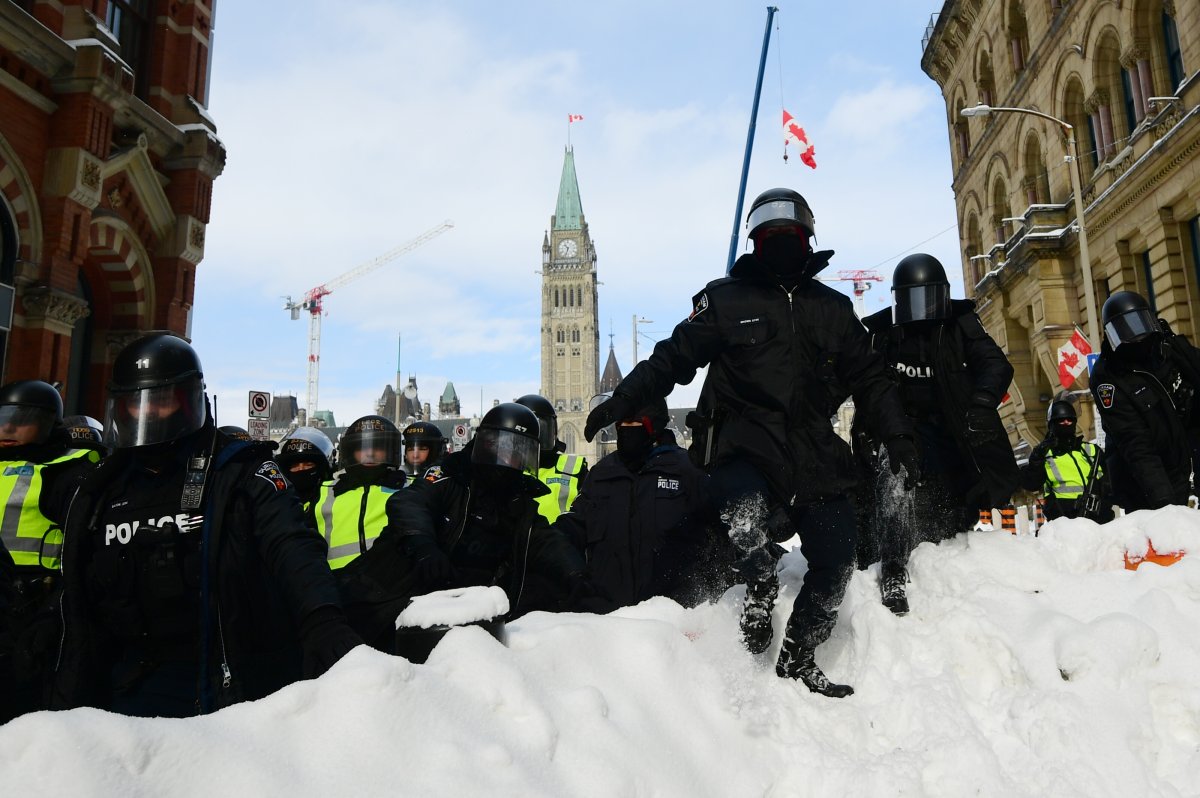 Ottawa police use anti-riot weapons on convoy protesters, arrest 170 ...