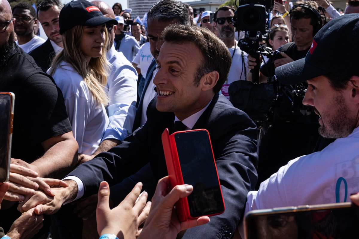Macron holds major campaign rally in Marseille, touts climate ...