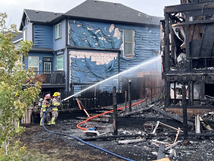 Airdrie emergency crews fight to contain residential structure fire ...