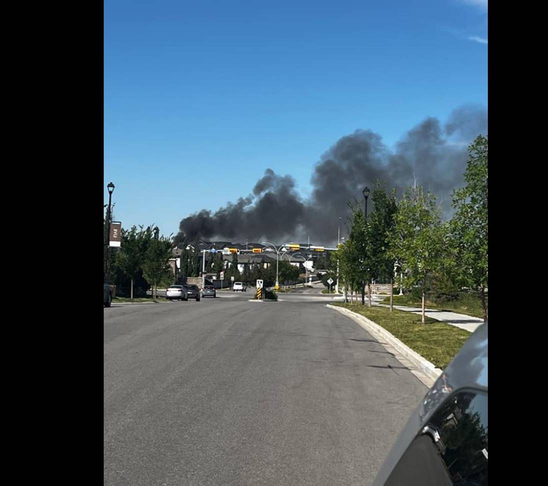 Airdrie emergency crews fight to contain residential structure fire ...