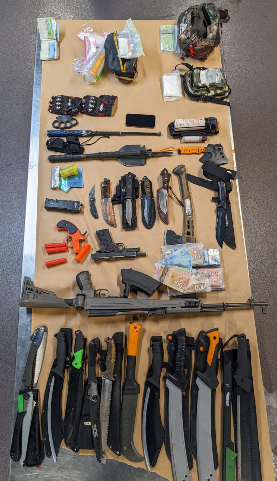 Weapons, stolen property seized in homeless camp by Kelowna RCMP ...