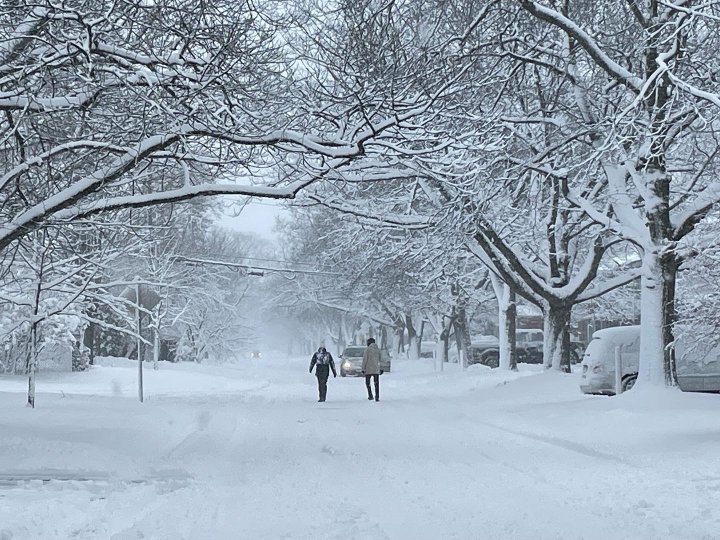 IN PHOTOS: Snowfall blankets parts of Canada as storm moves east ...