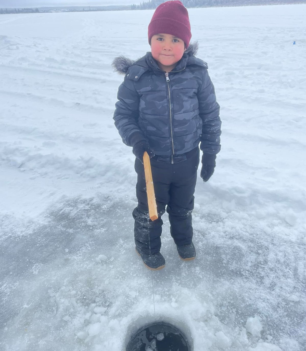 Land-based educator in Sask. school introduces students to ice fishing ...