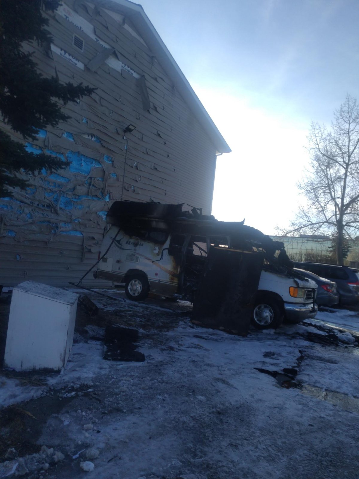 Calgary crews put out vehicle fire threatening nearby condos - Calgary ...