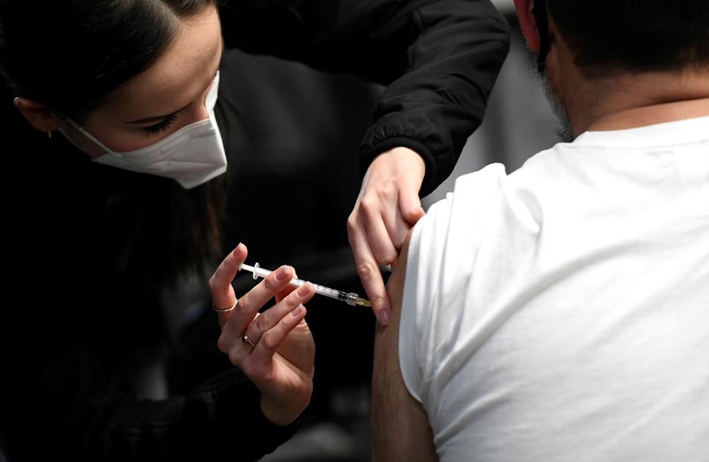 WHO now recommends high-risk people get COVID booster 12 months after ...