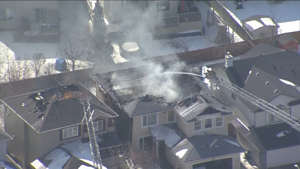 Man presumed dead, multiple houses damaged in northwest Calgary fire ...