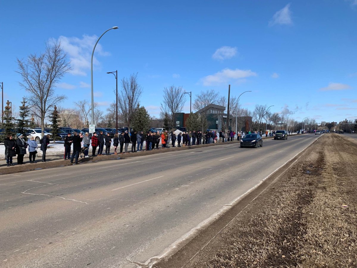 Edmontonians show support as bodies of slain police officers ...