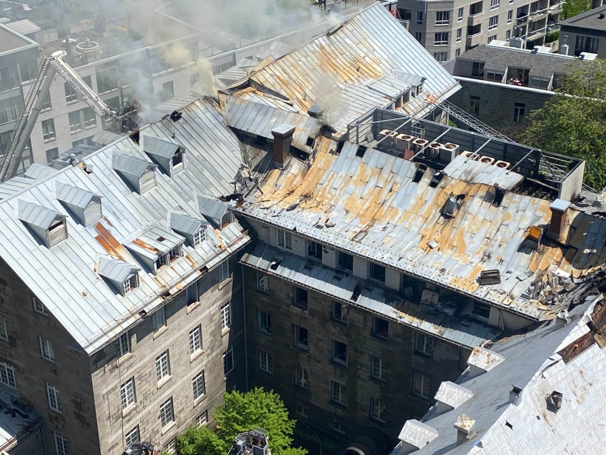 ‘Difficult to extinguish’ fire still burns at historic Montreal ...