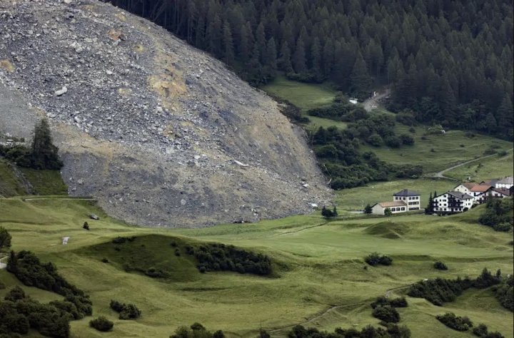 Astonishing photos show huge rockslide that missed Swiss village ‘by a ...