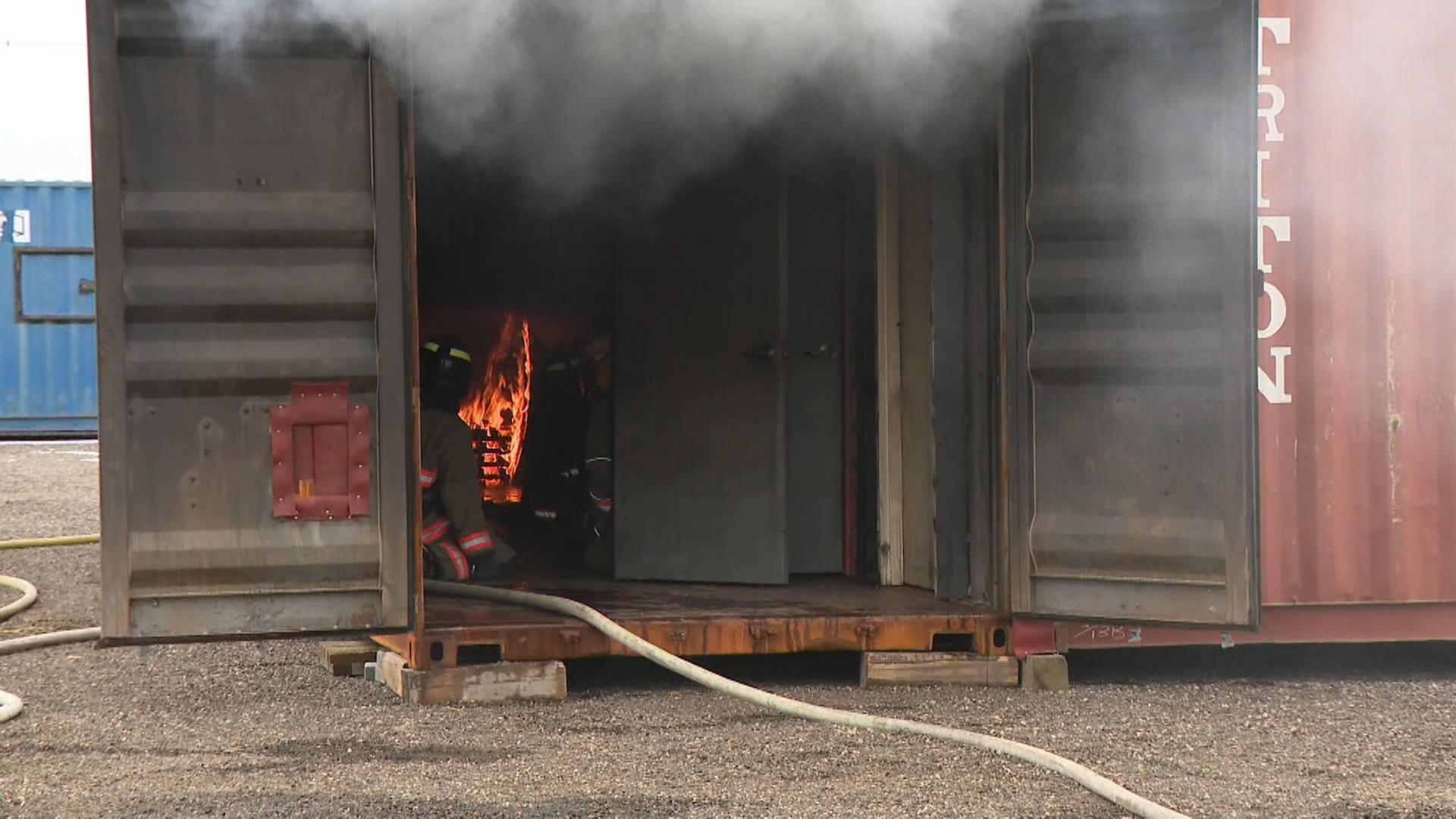 Saskatoon firefighters battle blazing sea-cans during live-training ...