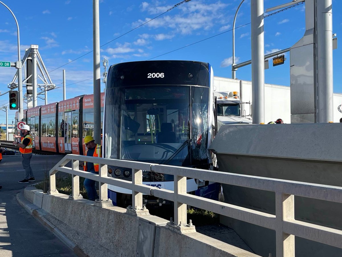 Semi turning against light and Valley Line LRT collide in southeast ...