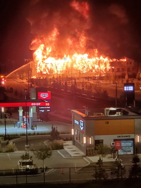 Massive, suspicious fire destroys townhouses in south Edmonton ...