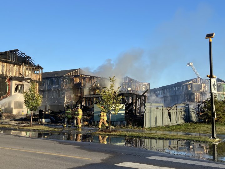 Massive, suspicious fire destroys townhouses in south Edmonton ...