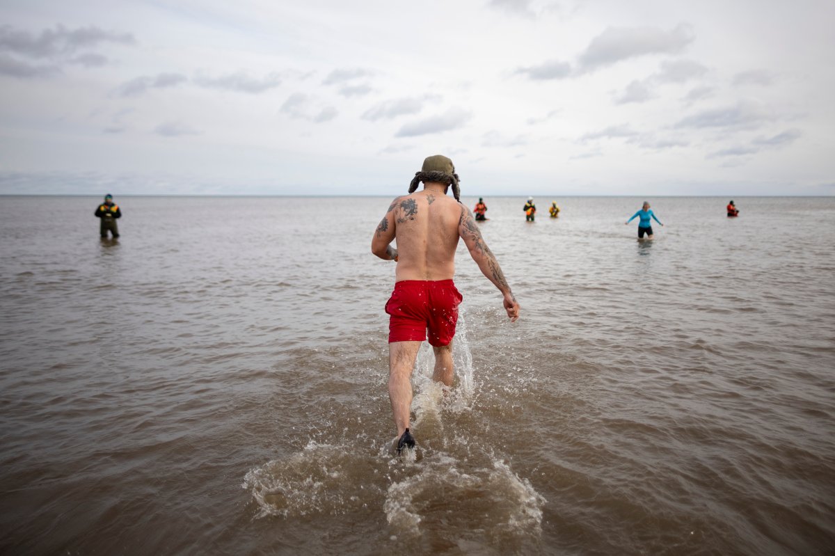 Canadians take the polar bear plunge to ring in 2025: ‘A little bit ...