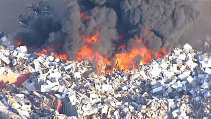 Flames, heavy black smoke from fire at Edmonton-area recycling plant ...
