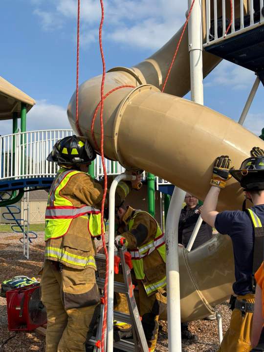 40-year-old man rescued after getting stuck in children’s slide ...