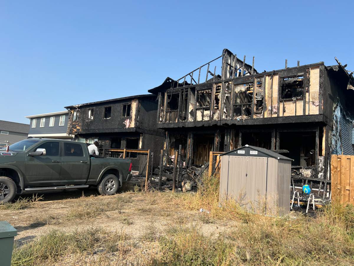 Dog dead, 12 people displaced after fire destroys 2 townhomes in southeast Calgary - Calgary ...