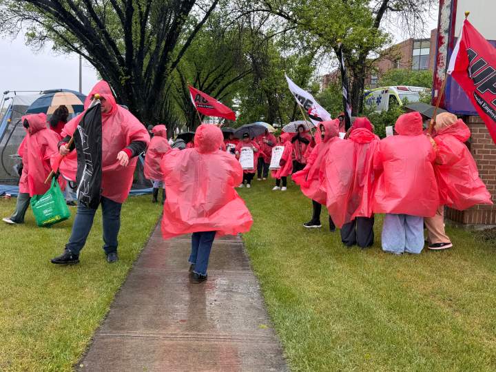 Alberta health-care workers rally in Calgary for better job conditions ...